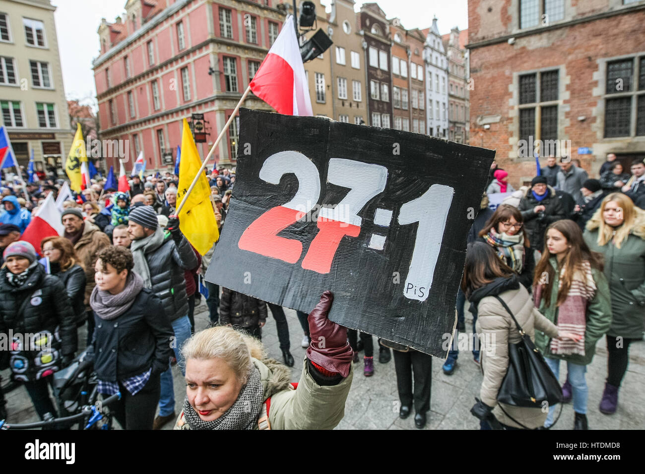 Gdansk, Poland. 11th March 2017. Protesters with banner that speaks 27: ...