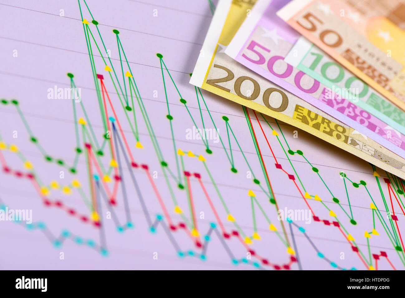 graph shows success on exchange market with Euro banknotes Stock Photo ...