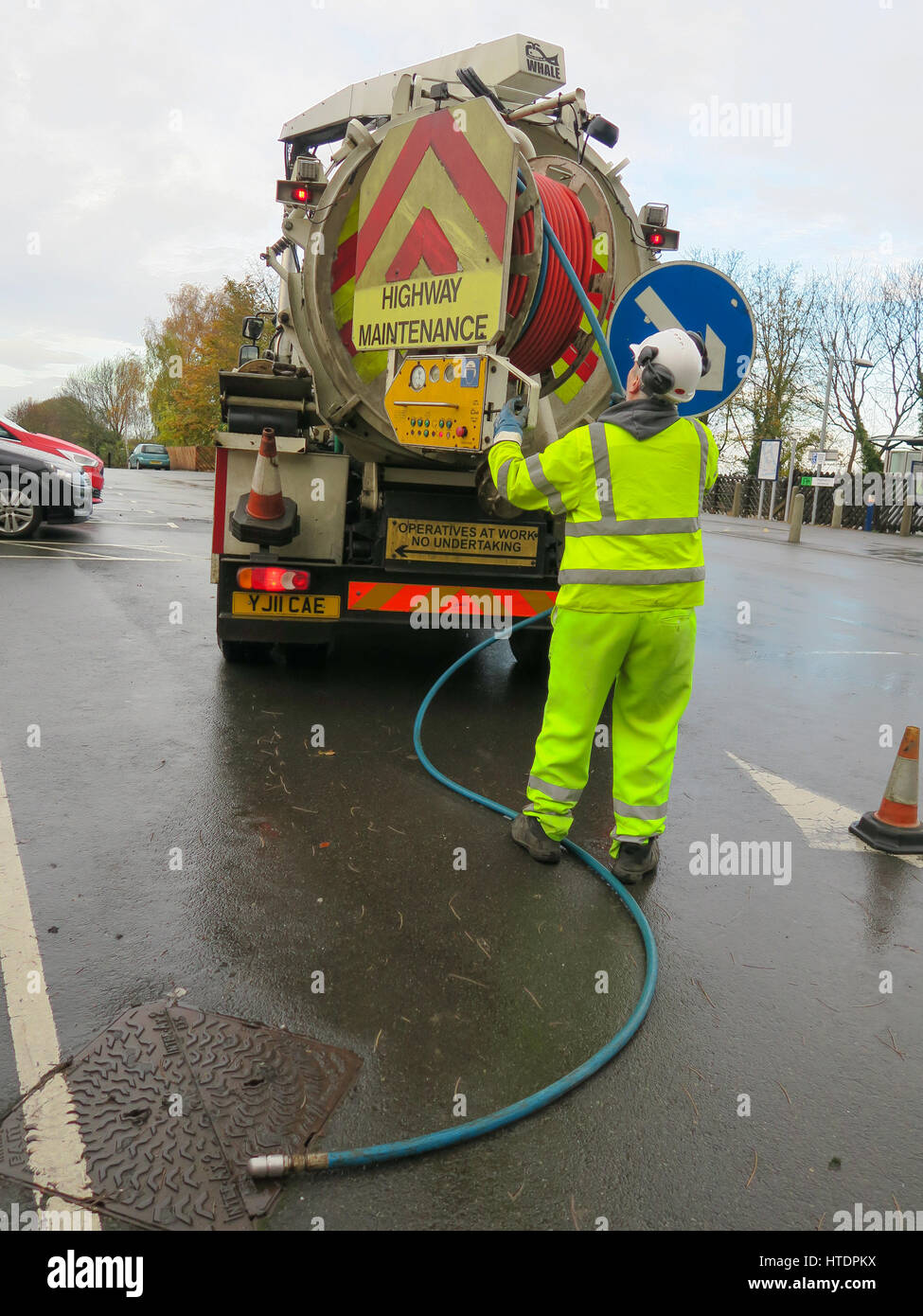 Drainage clearance team and gully tanker Stock Photo - Alamy