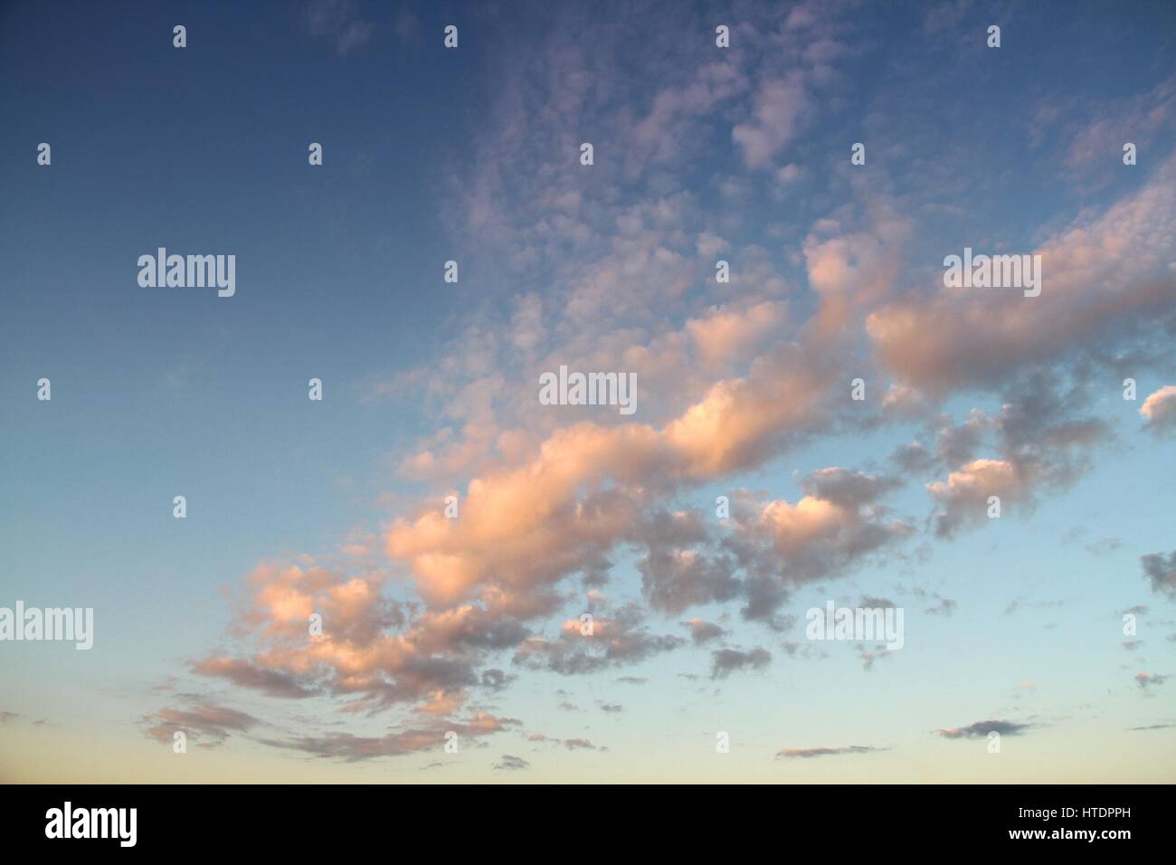Blue sky with clouds during sunset Stock Photo - Alamy