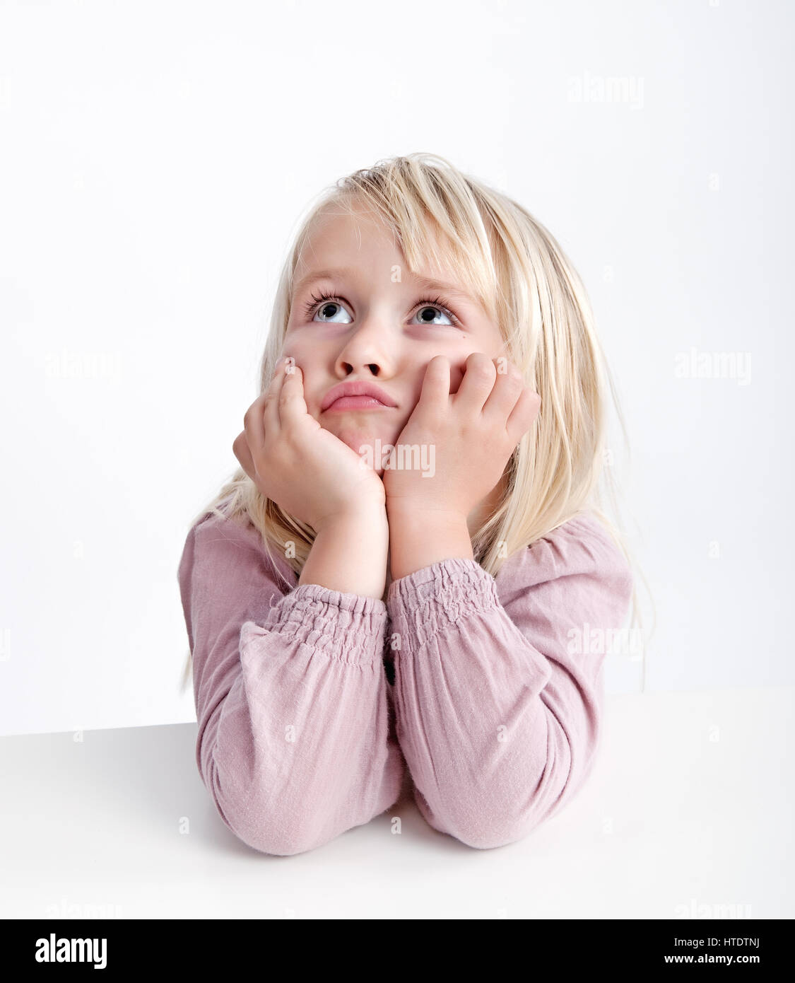 portrait of a young bored girl Stock Photo - Alamy