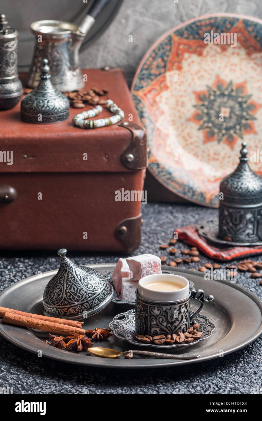 Turkish coffee and turkish delight with traditional embossed metal cup ...