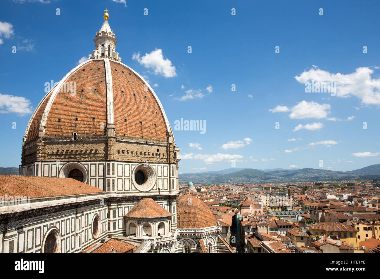 Dramatic view of the marble facade and dome of the Cathedral of ...