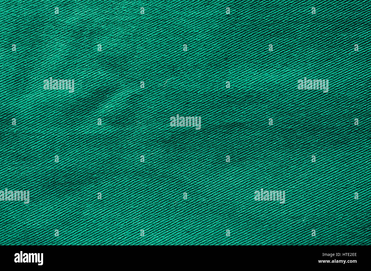 Green fabric background. Cloth texture as blank backdrop Stock Photo ...