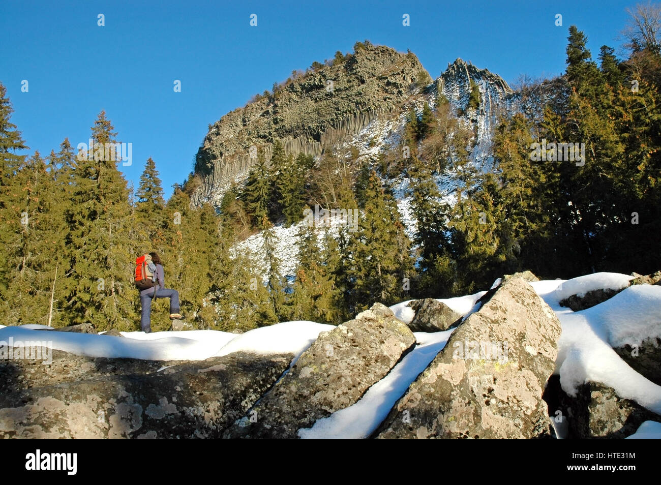 Basalt columns covered with snow. Detunatele, Romania Stock Photo - Alamy
