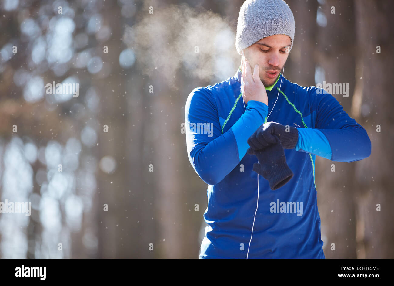 Sportsman control heart beats on cardio training in nature Stock Photo ...