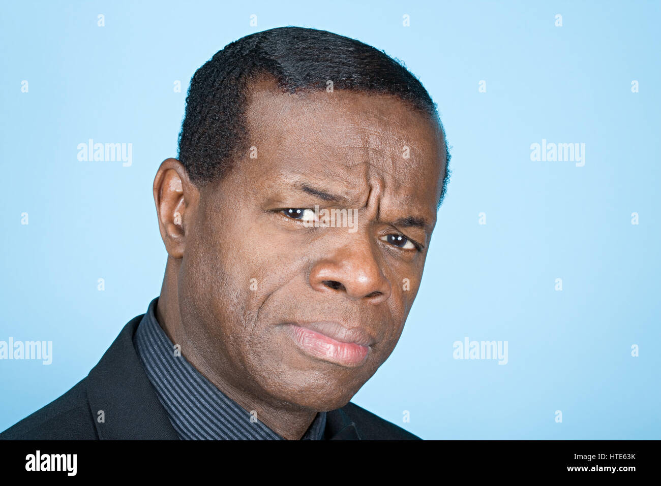 Confused african senior hi-res stock photography and images - Alamy