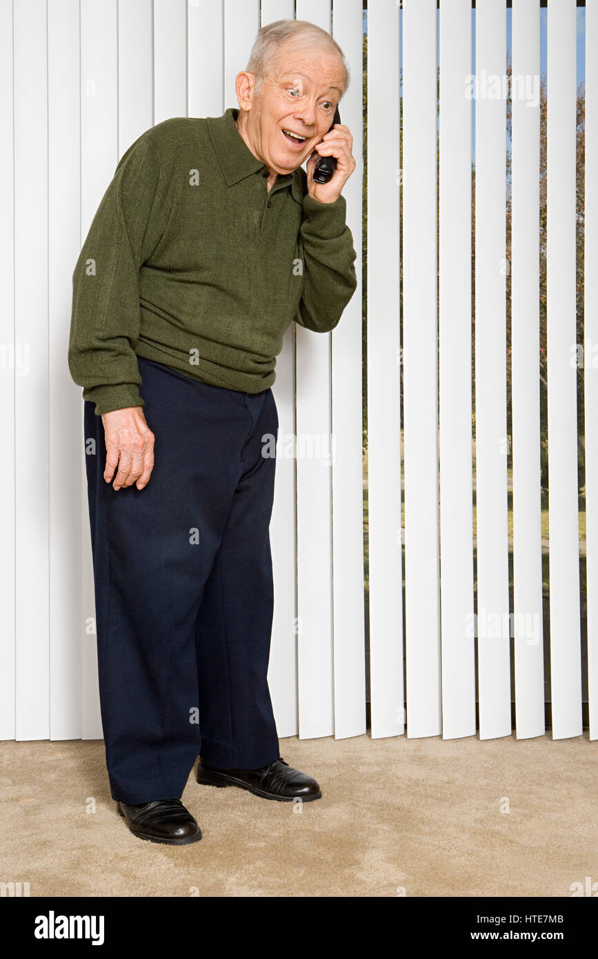 Elderly man on the telephone Stock Photo - Alamy