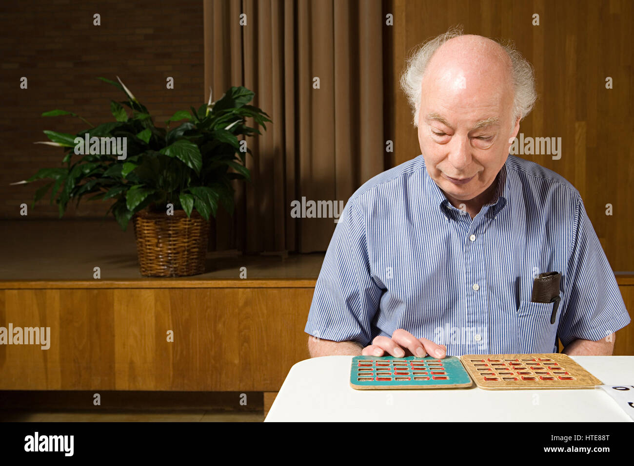 Senior man playing bingo Stock Photo - Alamy
