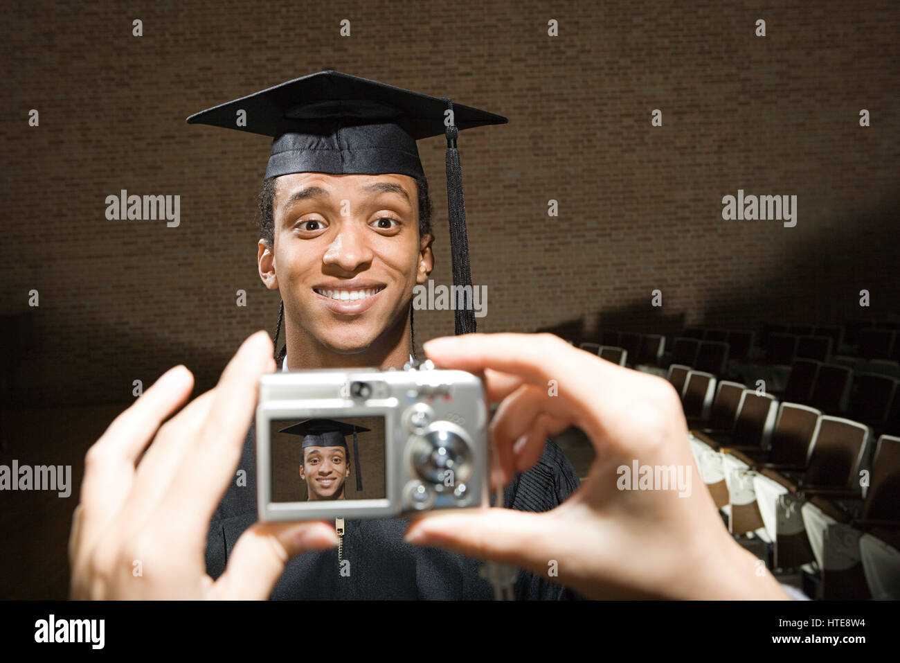 Graduate having photograph taken hi-res stock photography and images ...