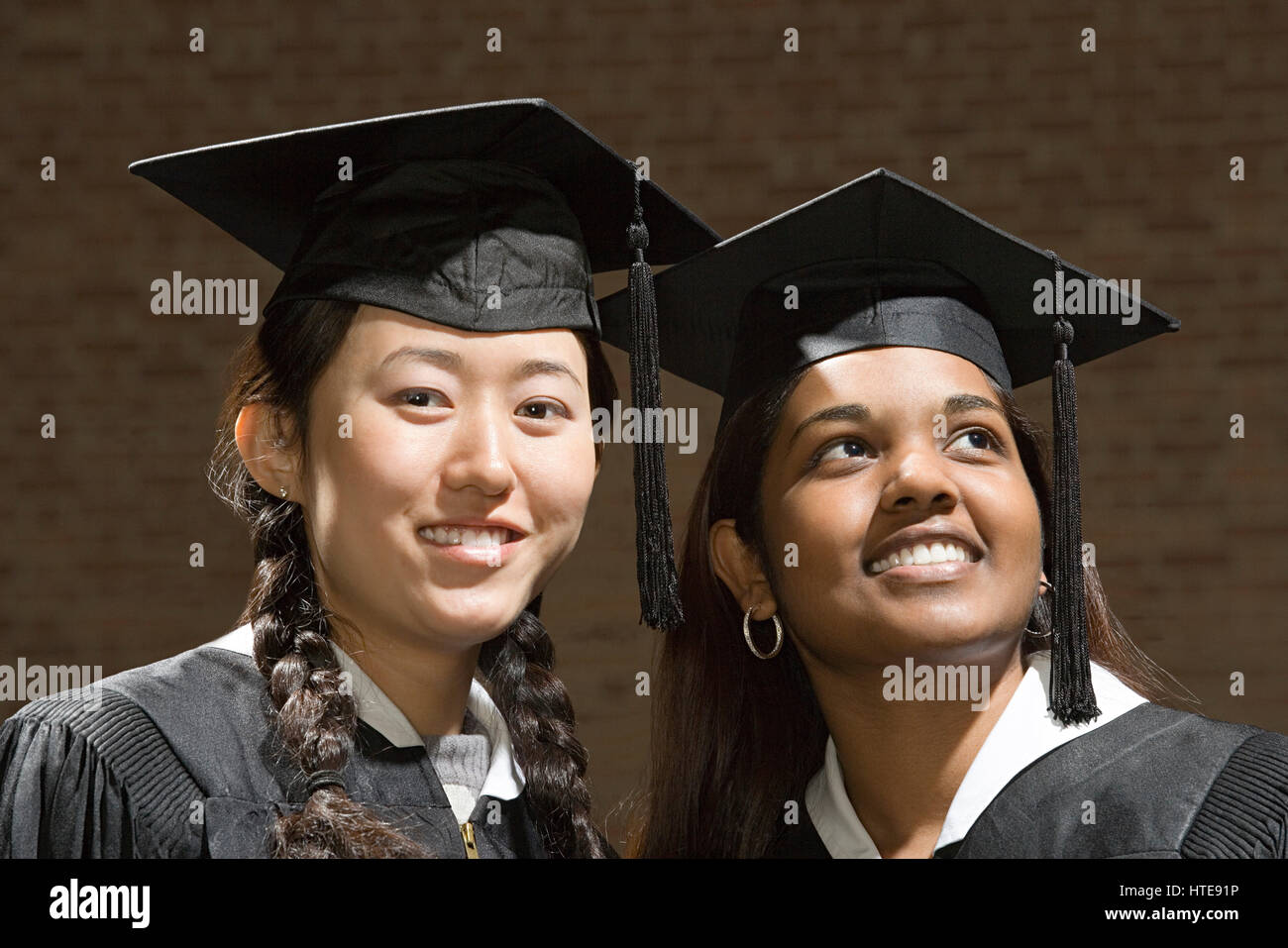 Two female graduates Stock Photo - Alamy