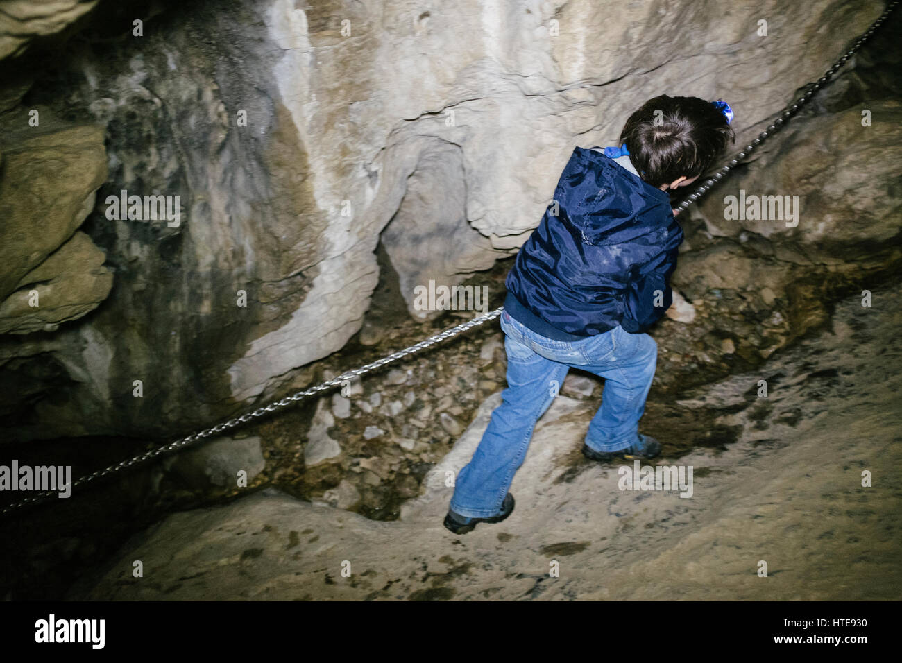 Children explore cave hi-res stock photography and images - Alamy