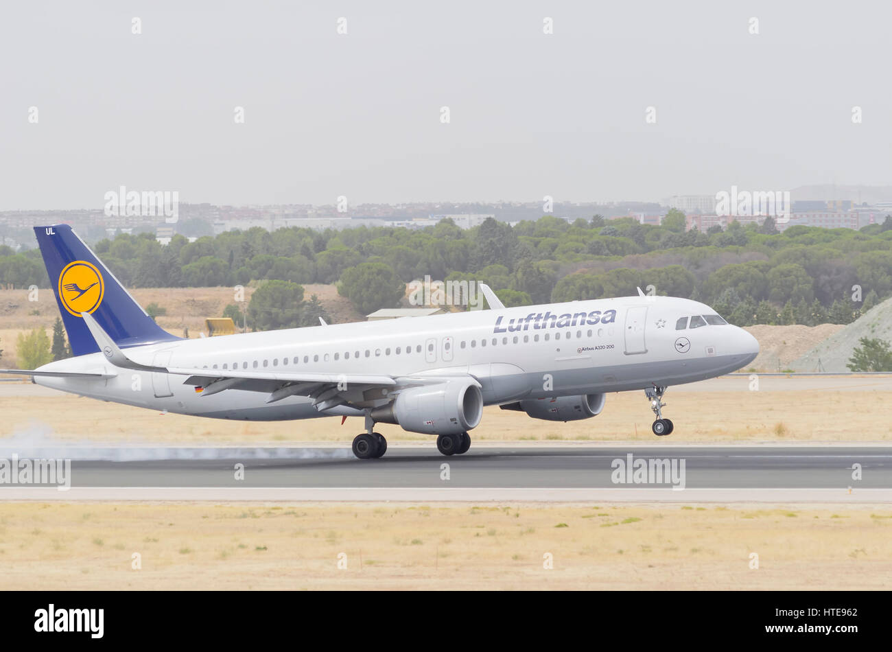 Plane Airbus A320, of Lufthansa airline, is landing on Madrid - Barajas, Adolfo Suarez airport ...