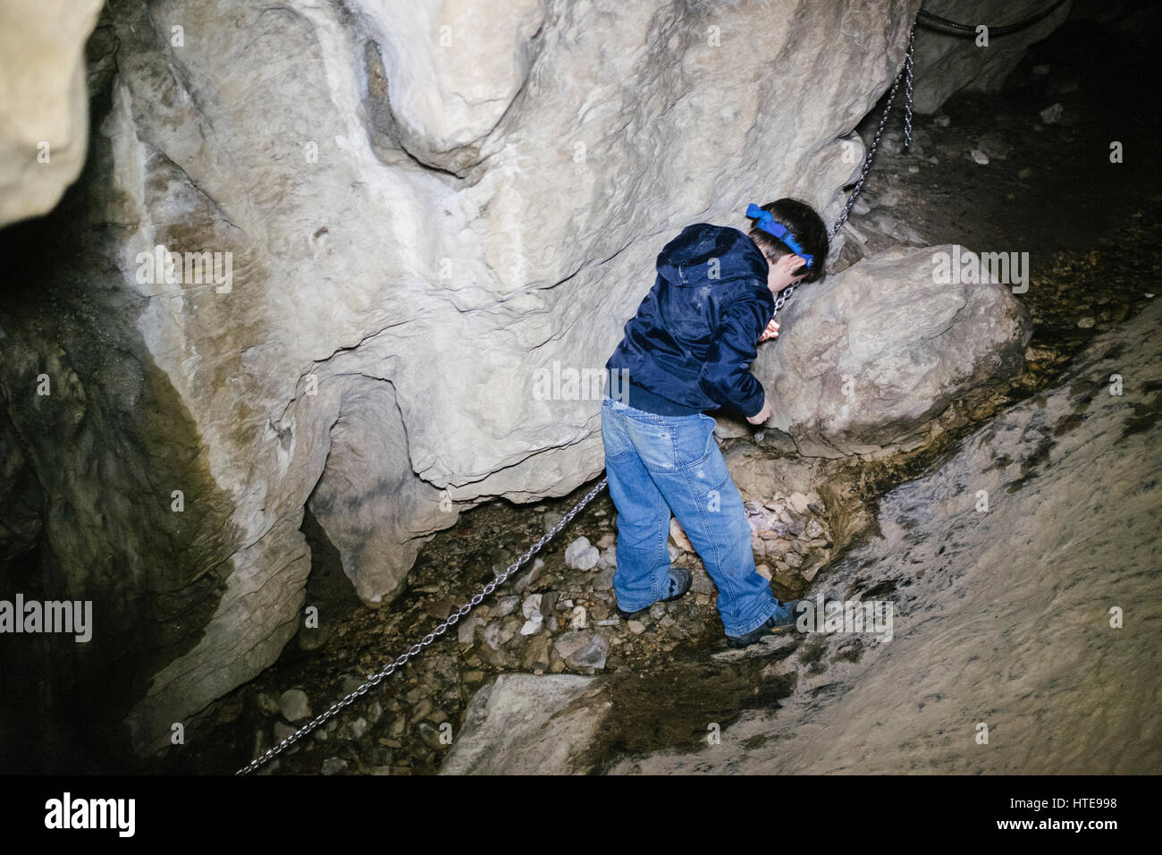 Children explore cave hi-res stock photography and images - Alamy