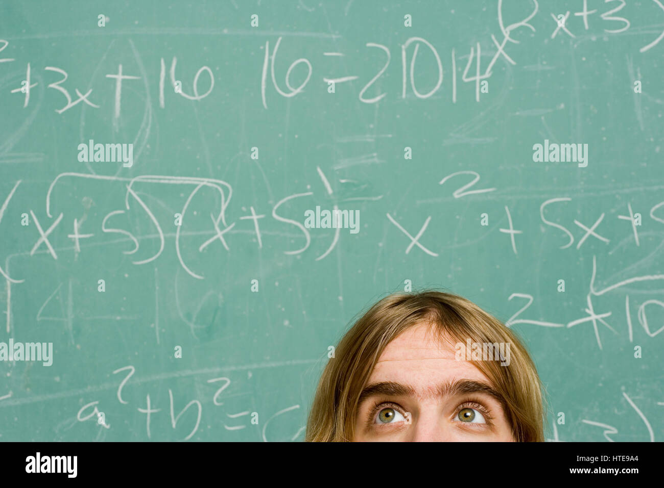 Male student looking nervous Stock Photo - Alamy