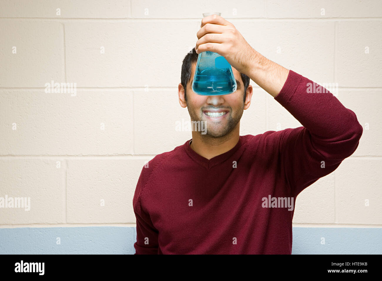 Scientist performing experiment chemical hi-res stock photography and ...