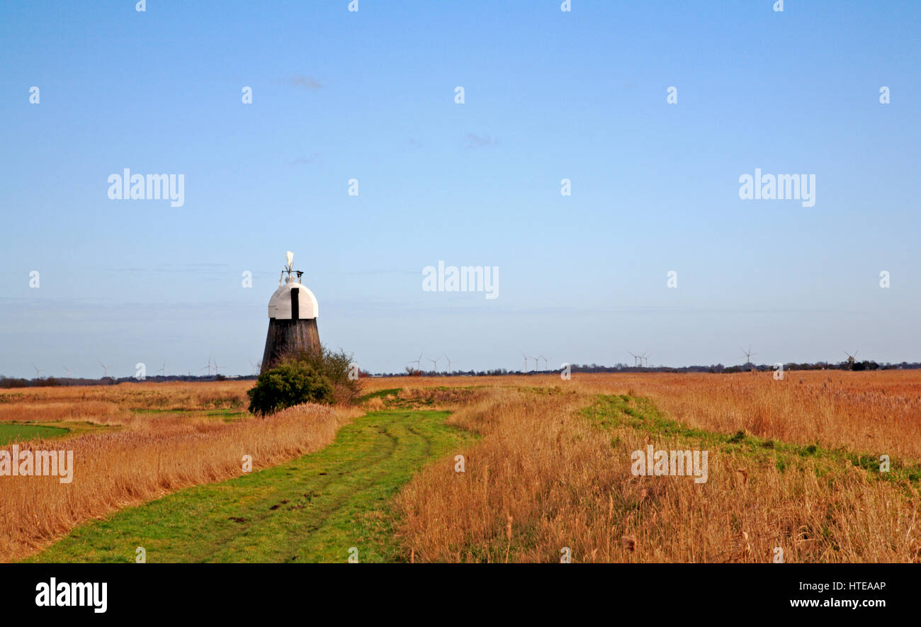A view of a farm track and footpath passing the partially restored ...
