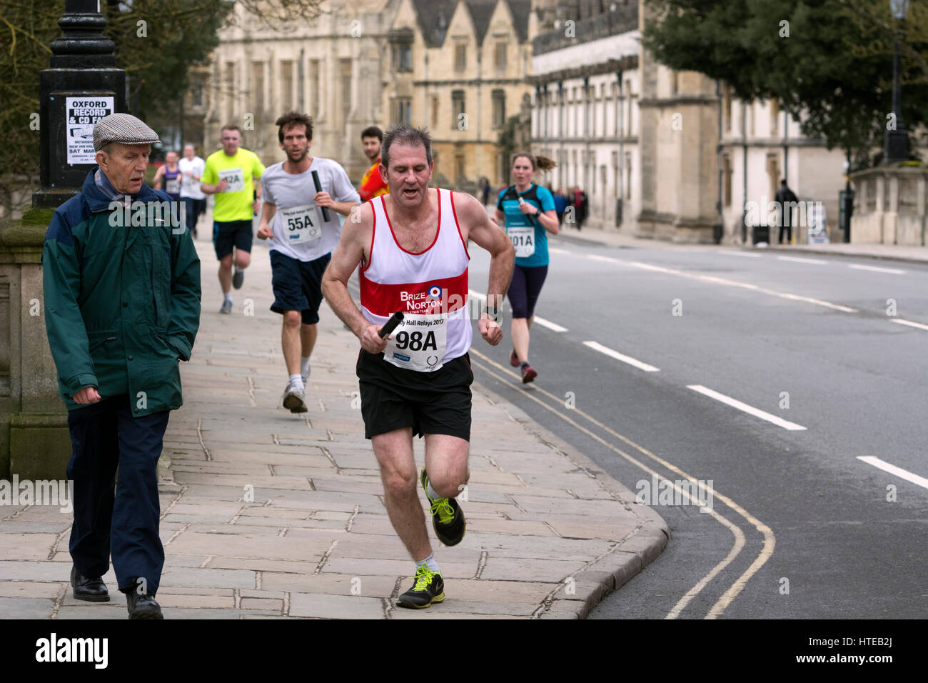 Runners crossing Magdalen Bridge in the Teddy Hall Relays, Oxford, UK ...