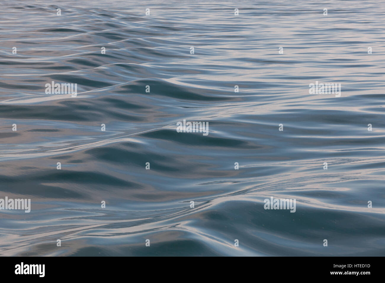 Abstract image of rolling bow waves made by a ship in the ocean Stock ...