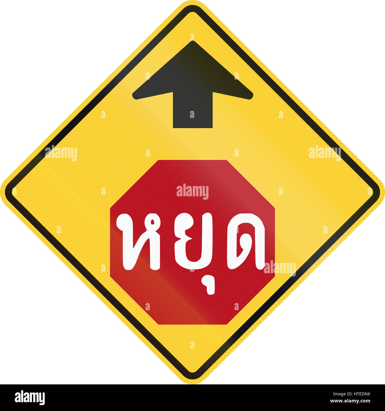 Warning road sign in Thailand - Stop Sign Ahead. The text means Stop ...