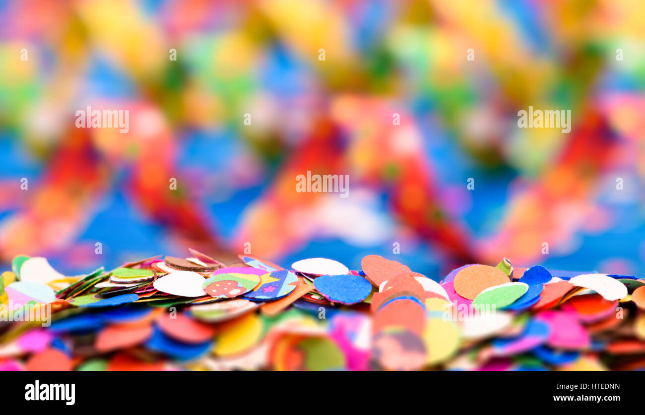 confetti and colorful paper streamer at carnival Stock Photo - Alamy
