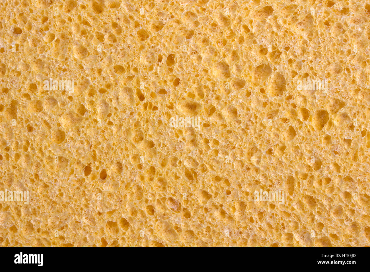 Yellow washing sponge texture hi-res stock photography and images - Alamy