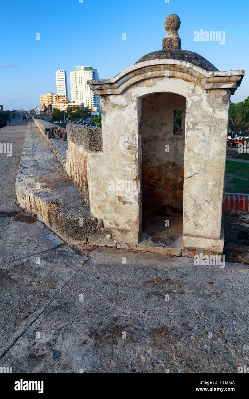 The inside of a colonial turret juxtaposed with modern buildings in ...
