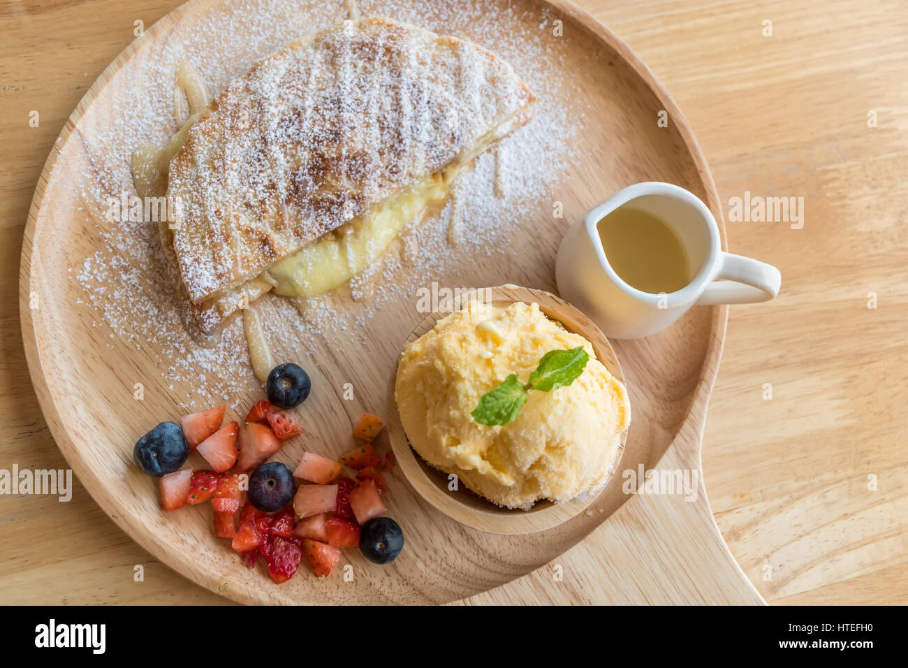 closeup fresh homemade dessert soft vanila roti with cool ice cream ...