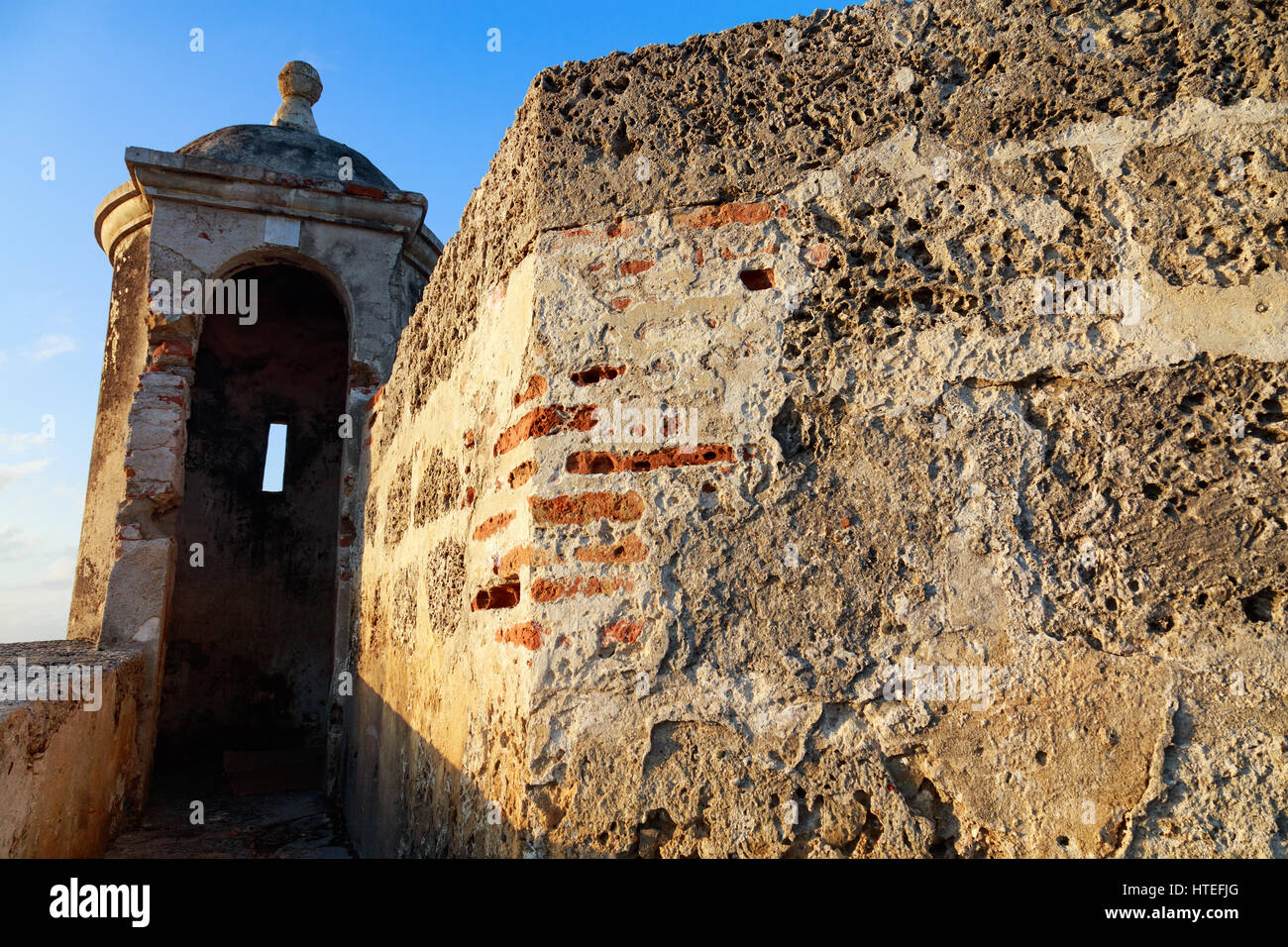 The Caribbean tropical sunset hits the colonial wall of Cartagena ...