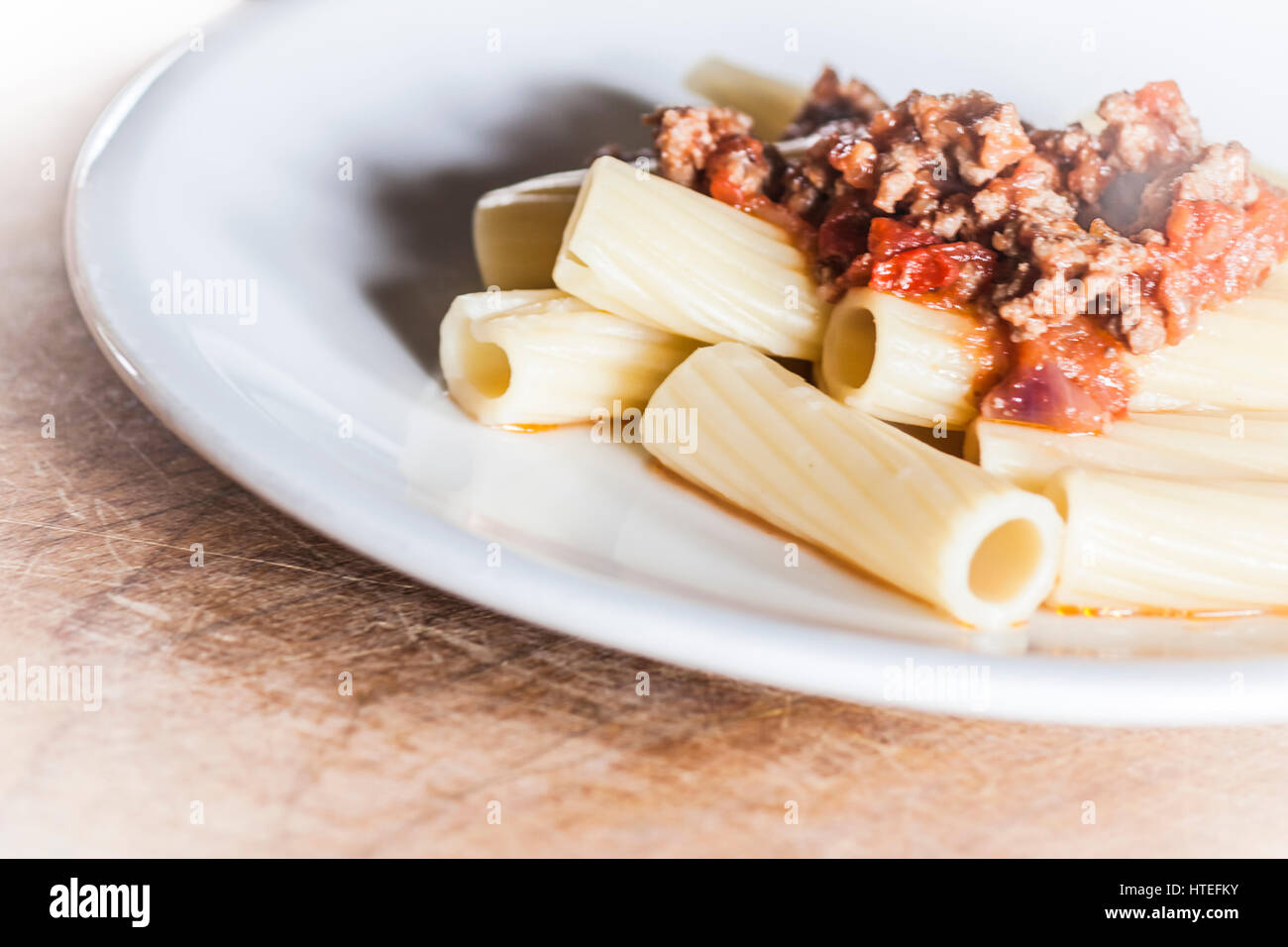 Italian rigatoni pasta with ragù alla bolognese Stock Photo - Alamy