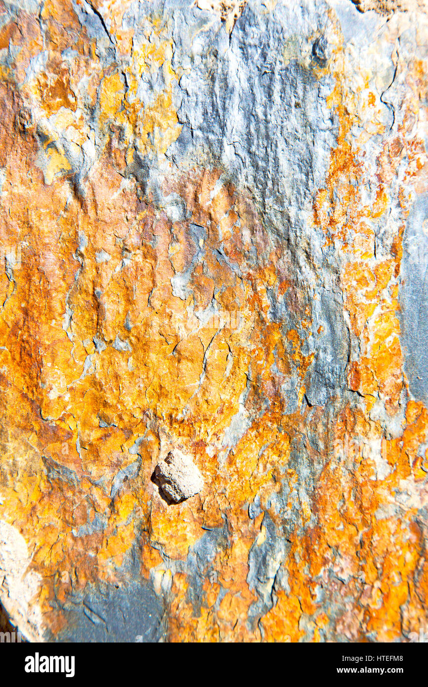 rocks stone and red orange gneiss in the wall of morocco Stock Photo ...