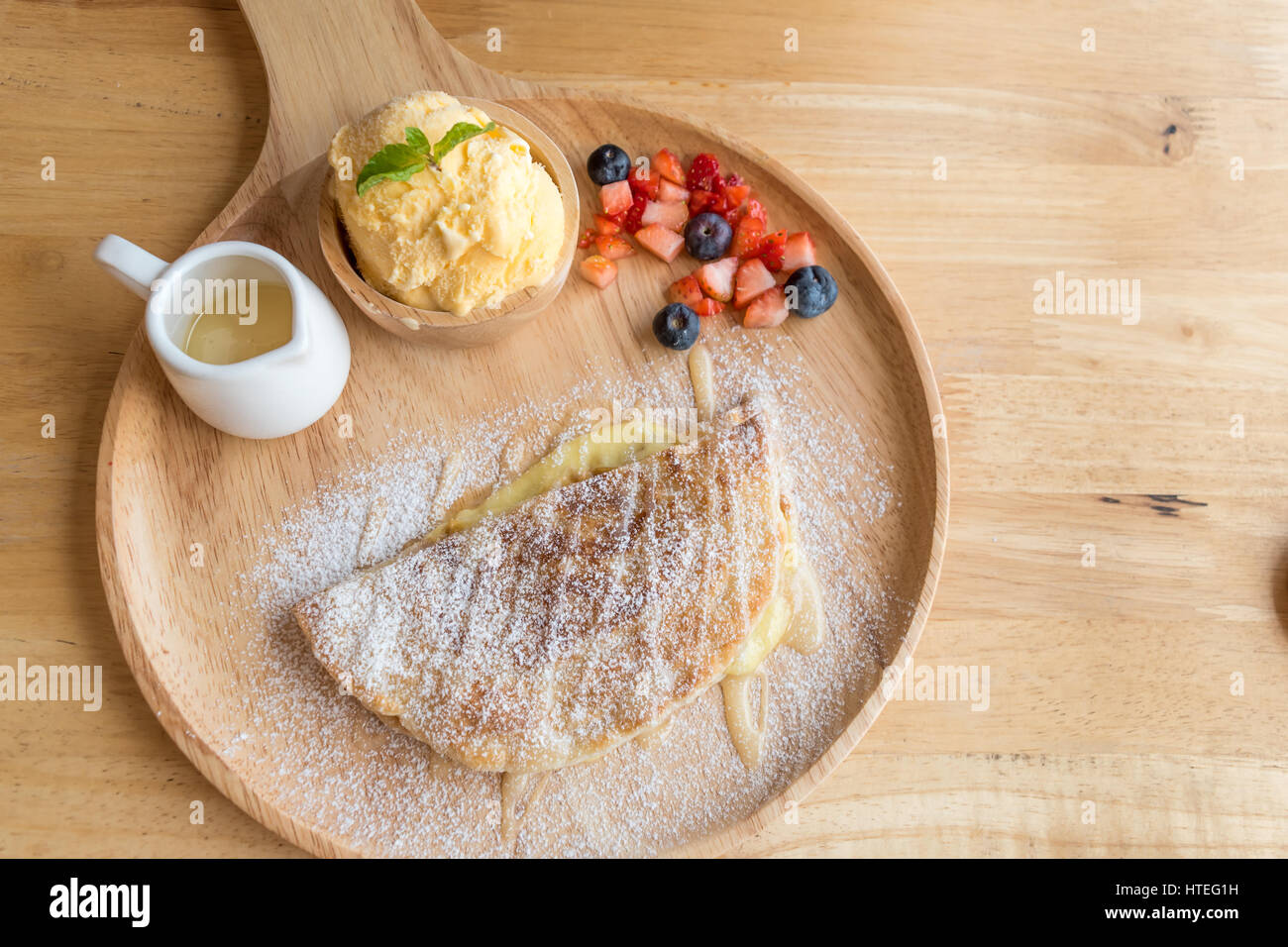 closeup fresh homemade dessert soft vanila roti with cool ice cream ...