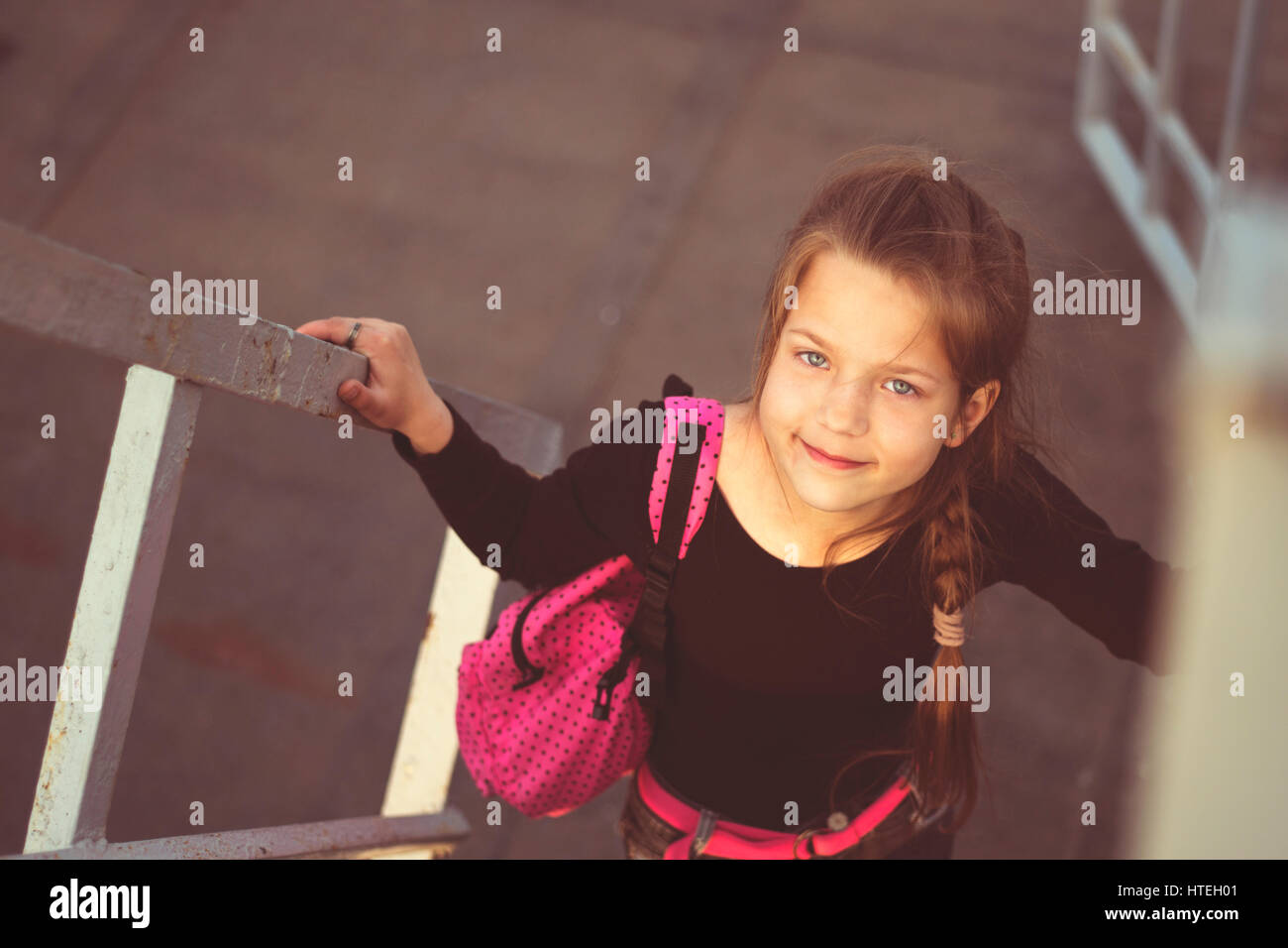 Ladder girl hi-res stock photography and images - Alamy