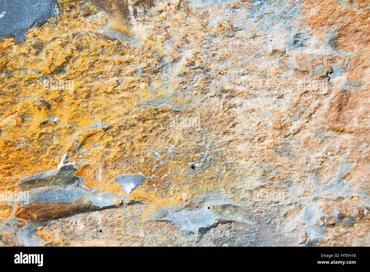 rocks stone and red orange gneiss in the wall of morocco Stock Photo ...