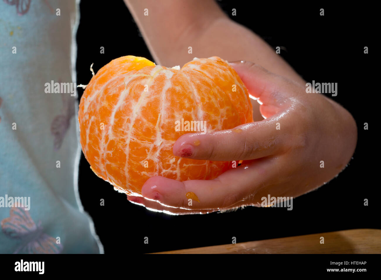 Peeling tangerine hi-res stock photography and images - Alamy