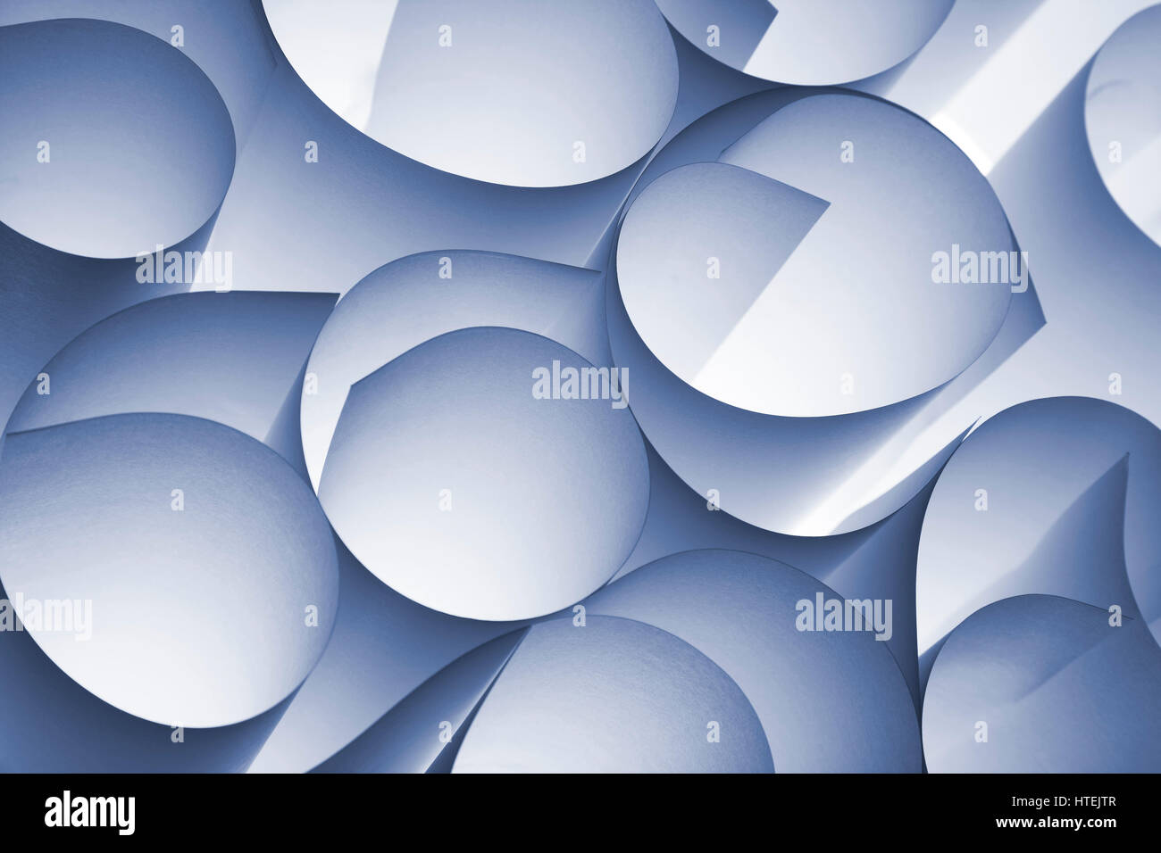 Paper rolls in blue, abstract Stock Photo - Alamy