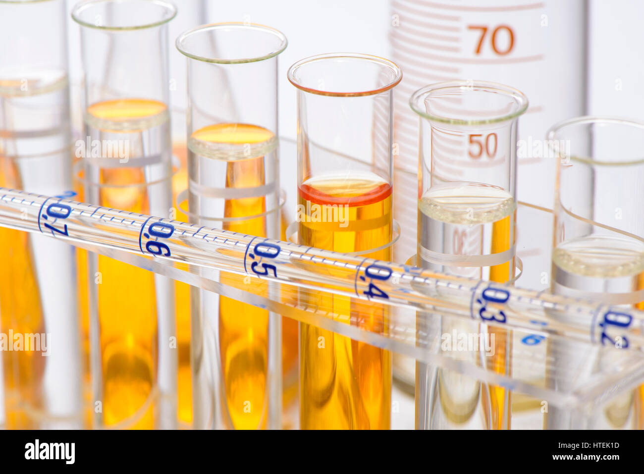 experiment in chemical laboratory with yellow liquid for analysis Stock ...