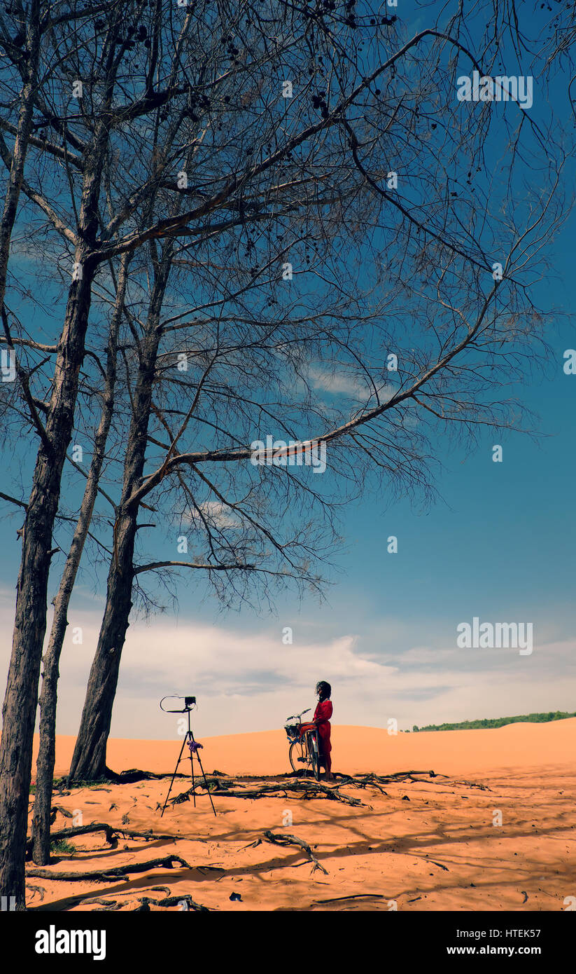 Woman alone on bike hi-res stock photography and images - Alamy