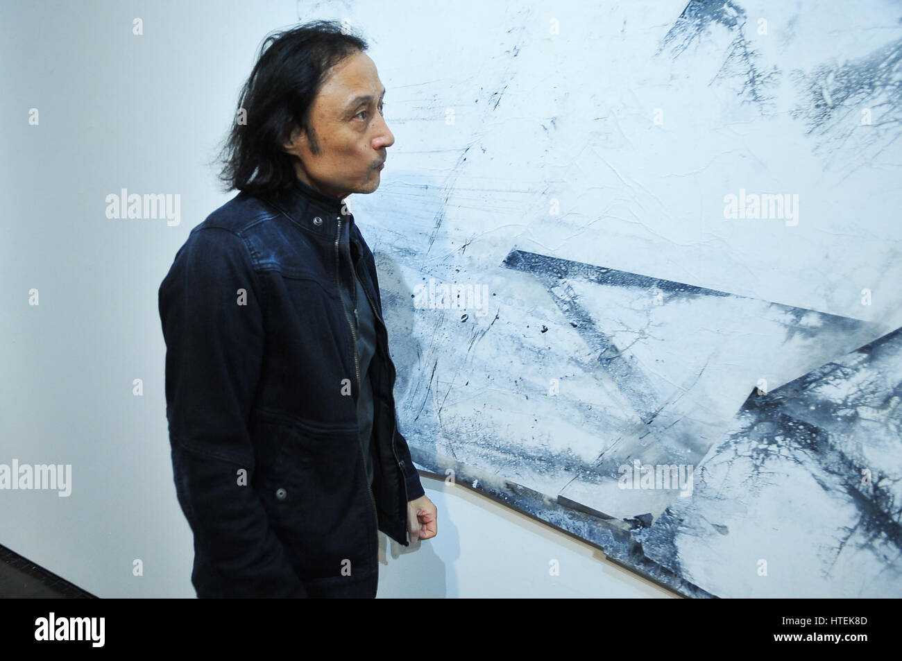 New York, USA. 09th Mar, 2017. Zheng Chongbin poses for photo in front ...