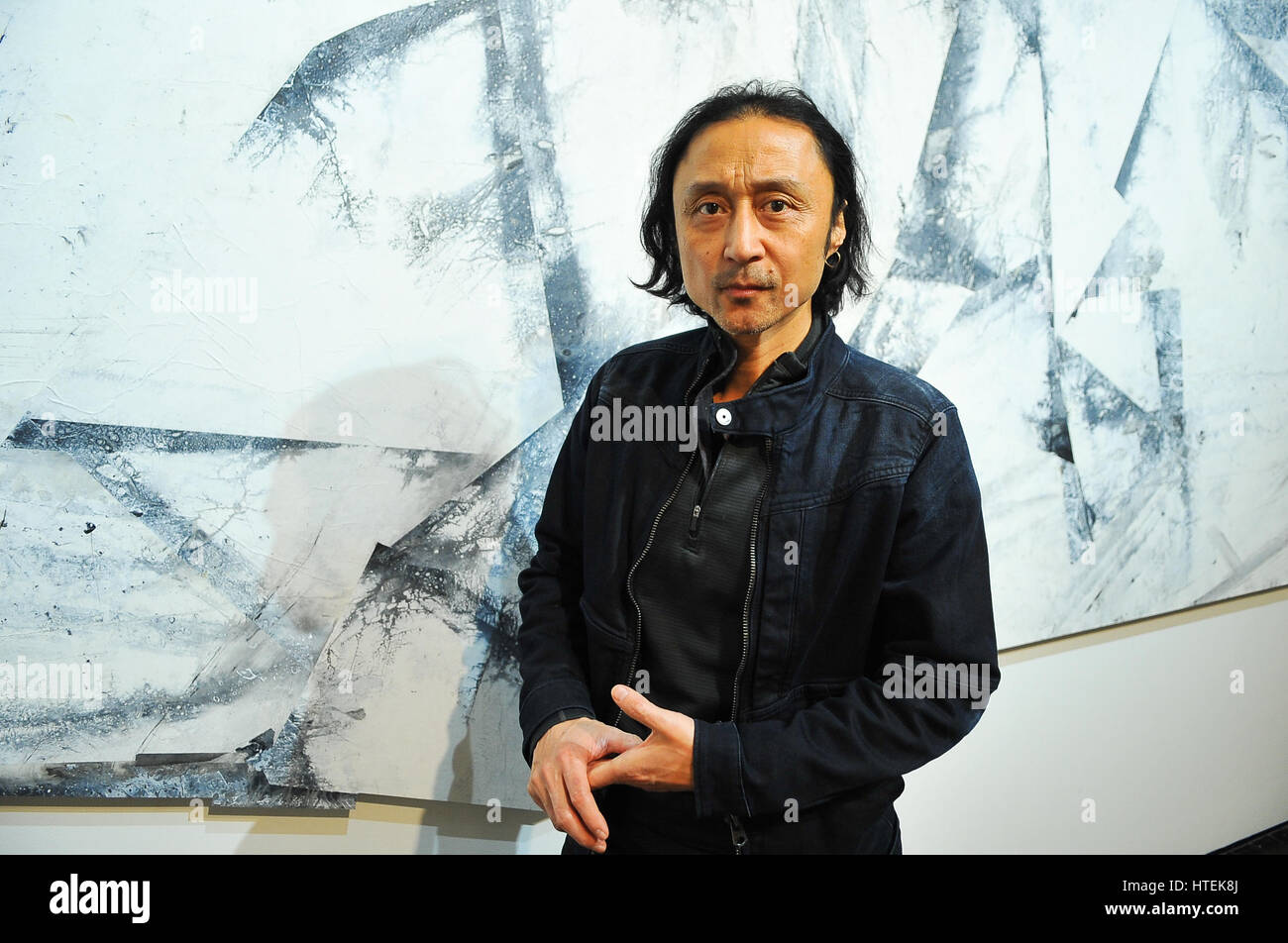 New York, USA. 09th Mar, 2017. Zheng Chongbin poses for photo in front ...