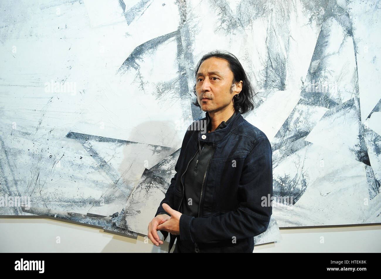 New York, USA. 09th Mar, 2017. Zheng Chongbin poses for photo in front ...