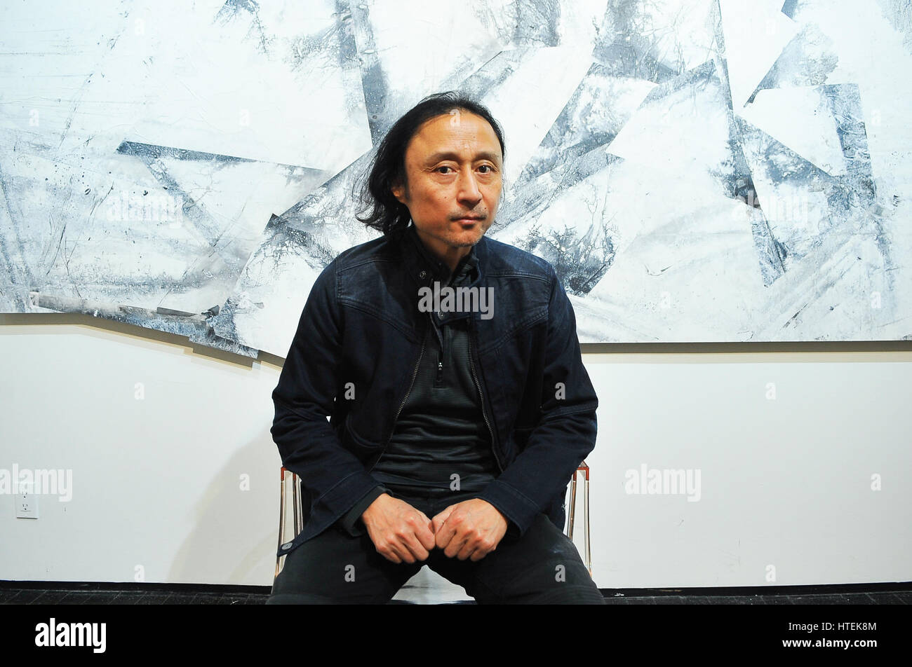 New York, USA. 09th Mar, 2017. Zheng Chongbin poses for photo in front ...