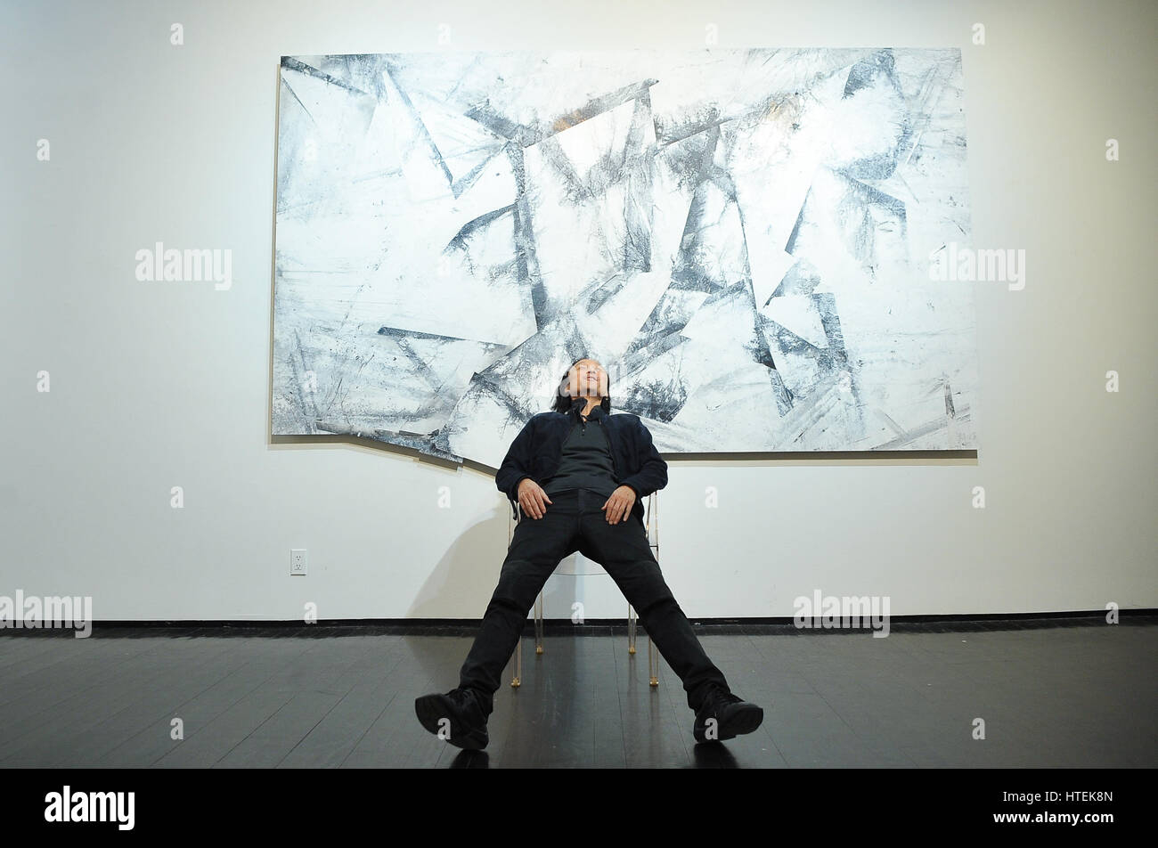 New York, USA. 09th Mar, 2017. Zheng Chongbin poses for photo in front ...
