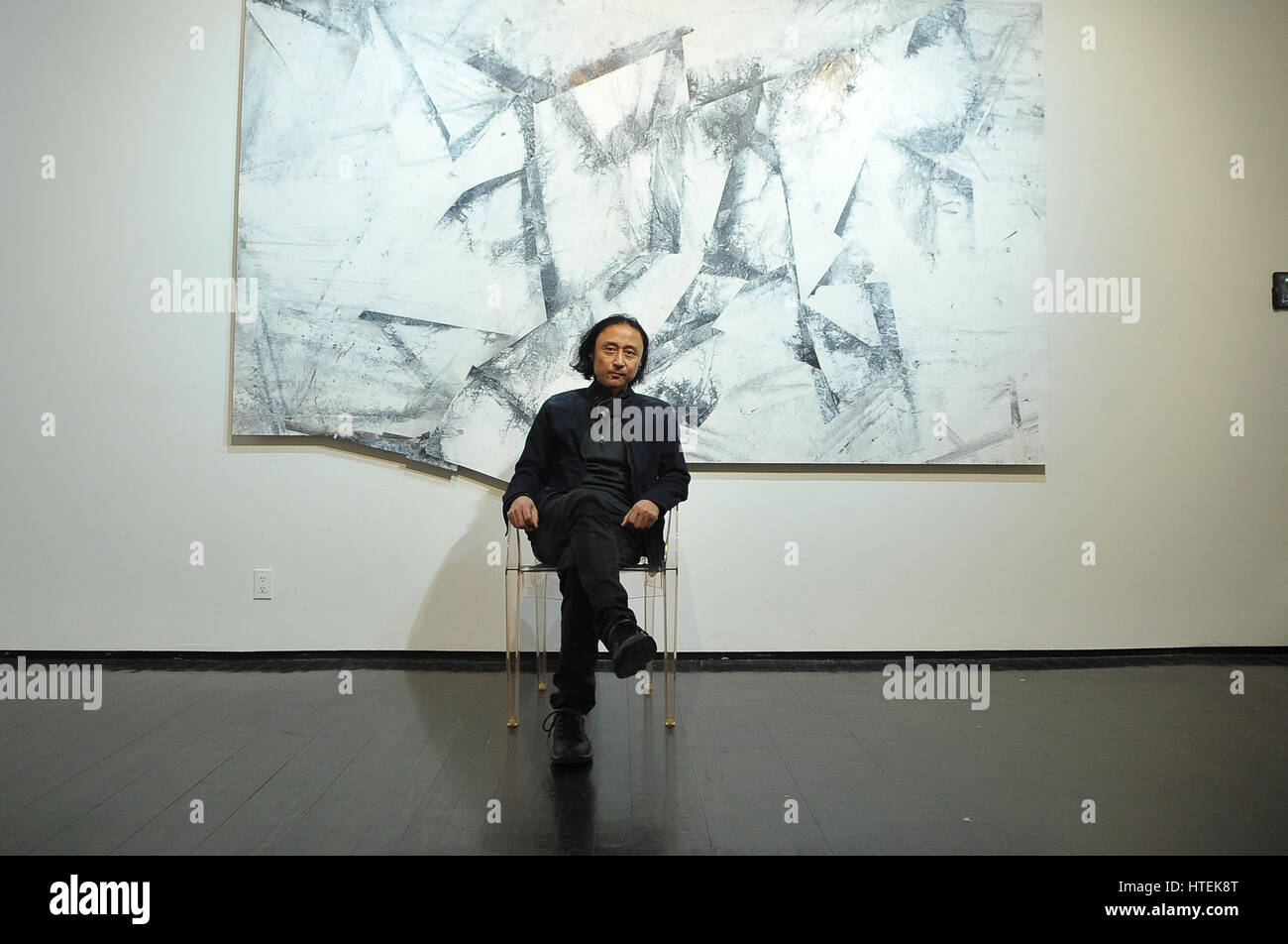 New York, USA. 09th Mar, 2017. Zheng Chongbin poses for photo in front ...