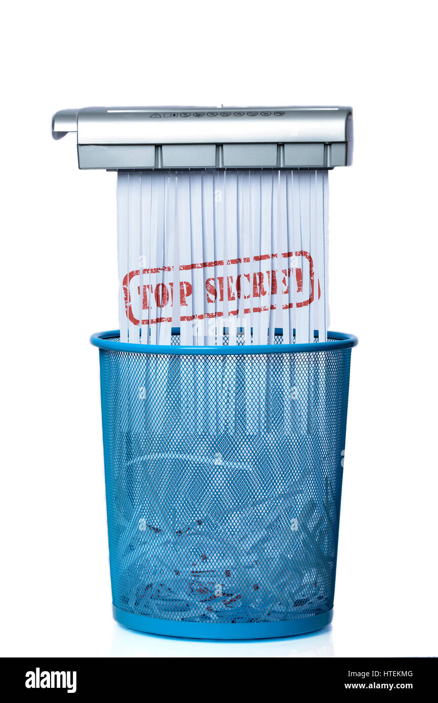 Destroy Top Secret Documents. Shredder documents with printed images ...