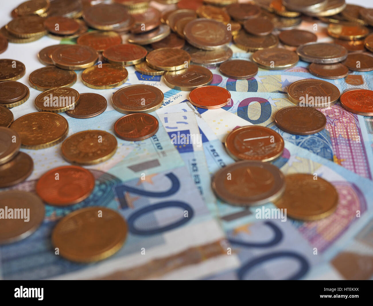 Euro (EUR) banknotes and coins, currency of European Union (EU) useful ...