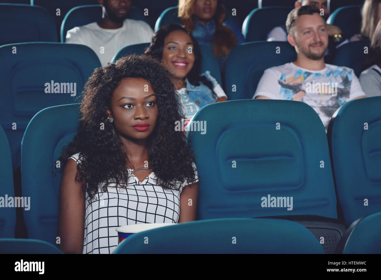 Watching looking interested technology hi-res stock photography and ...