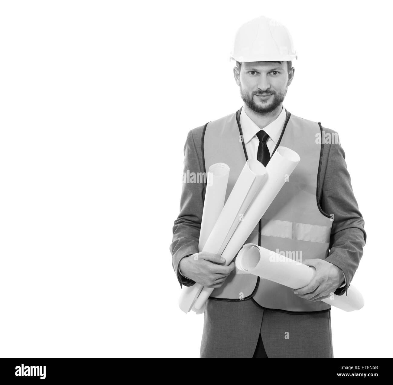 Developing business. Vertical studio portrait of a cheerful male ...