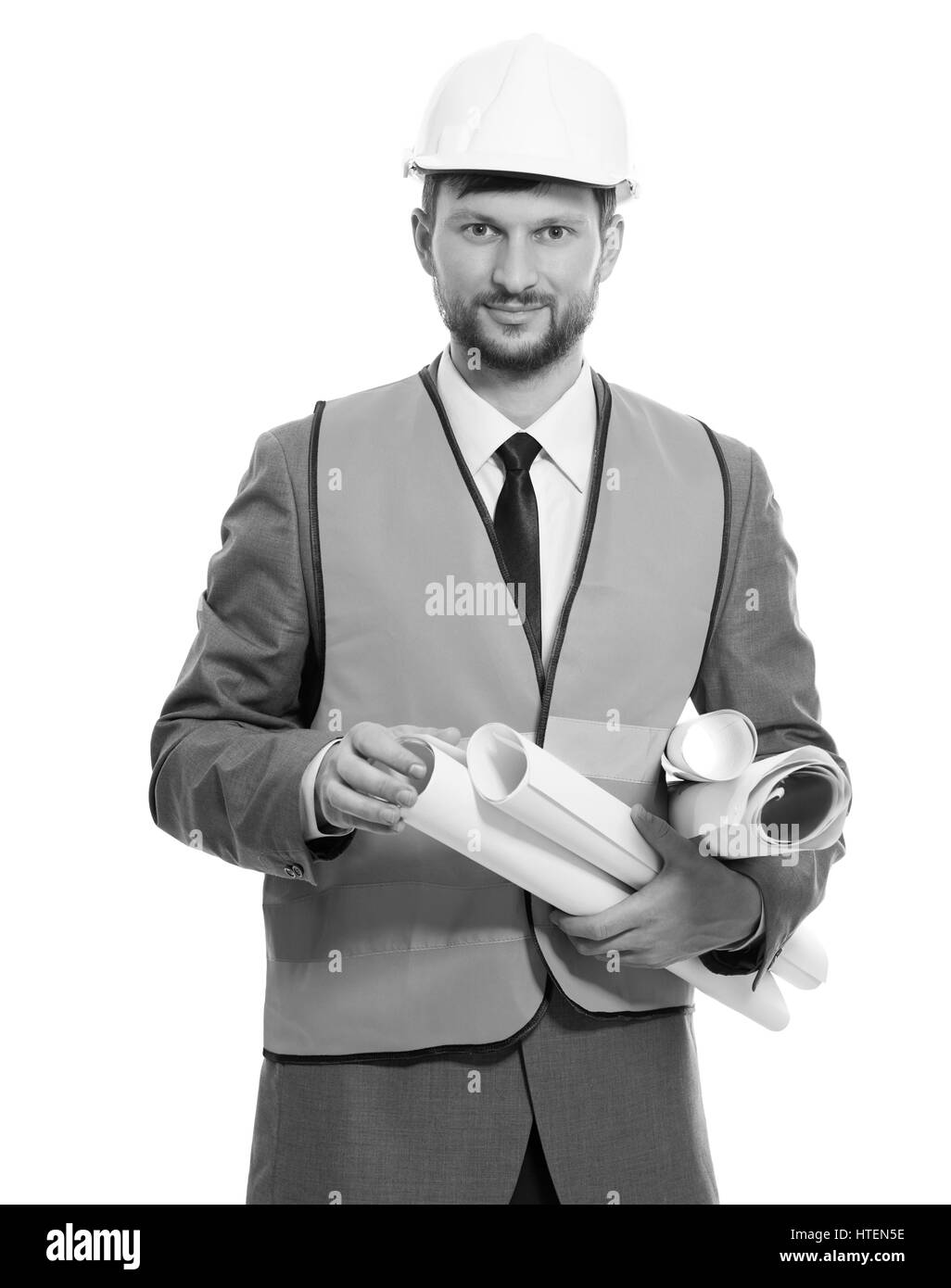 The best engineer. Black and white vertical studio shot of a confident ...