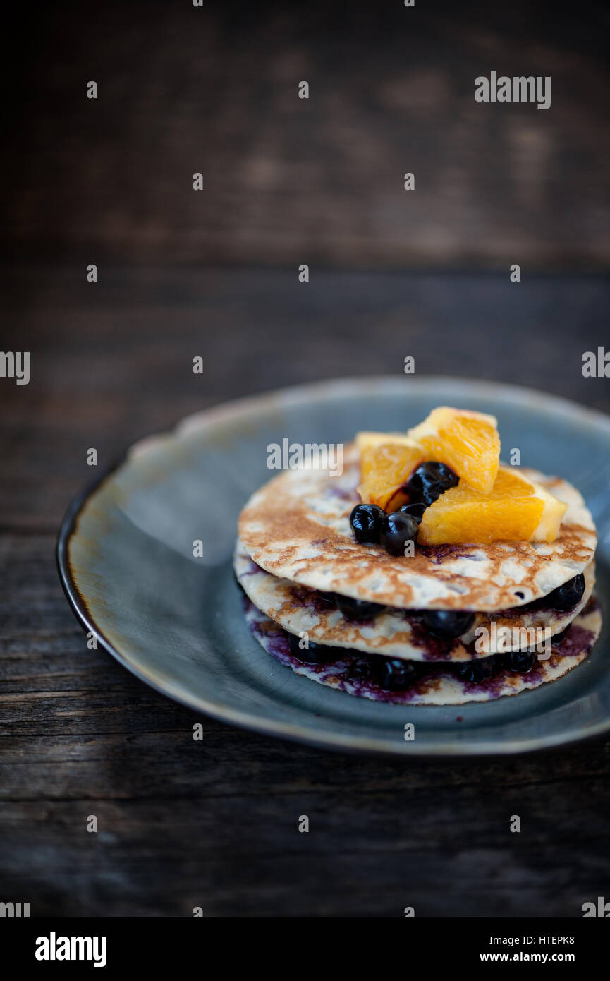 Small crepes cake with blueberries Stock Photo - Alamy